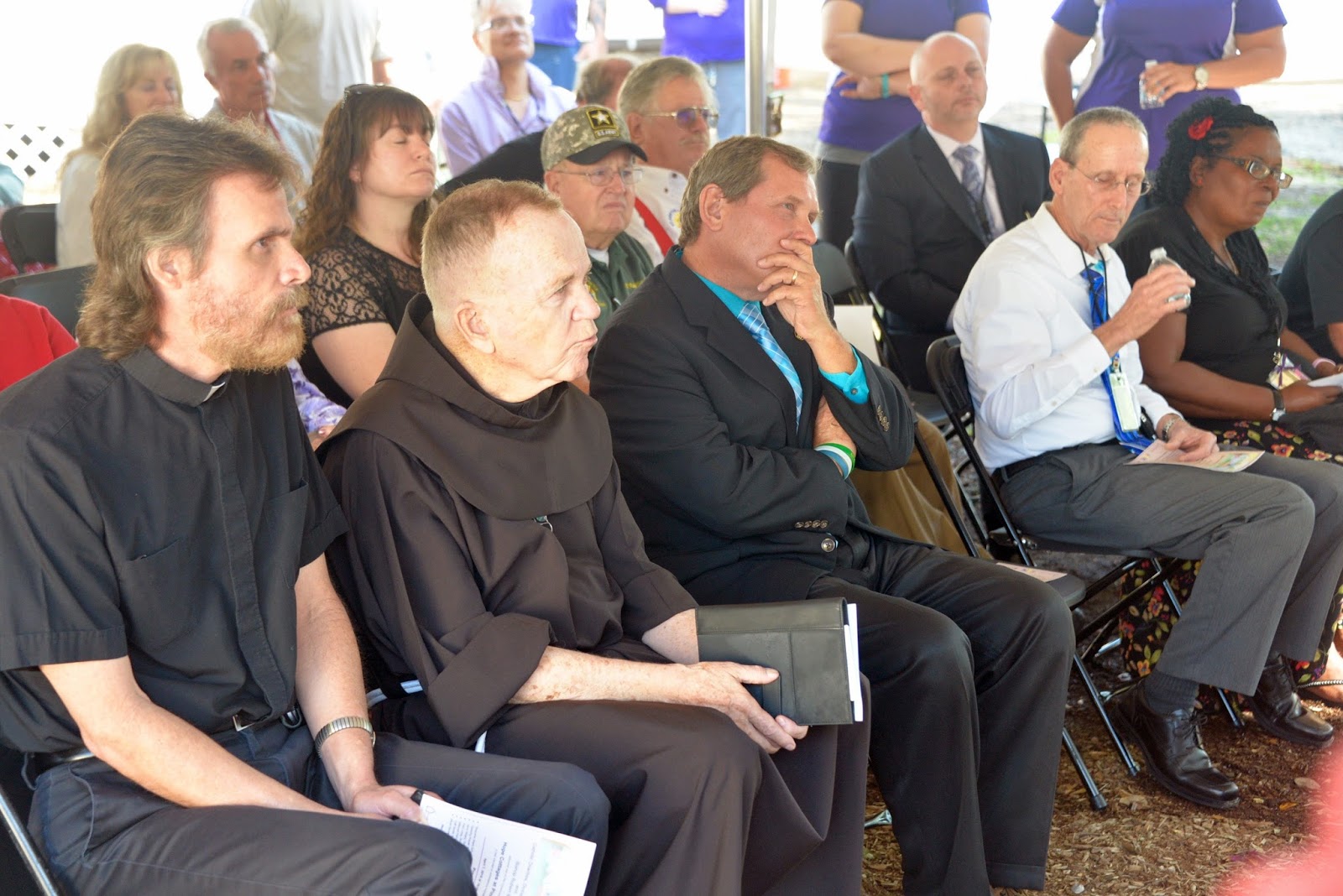 Bishop Lynch dedicates Hope Cottages at Pinellas Hope (photos by T ...